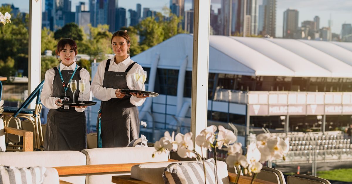 Serving with winning smiles at F1 Grand Prix